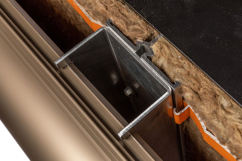 What is the U-value in rainscreen cladding design?