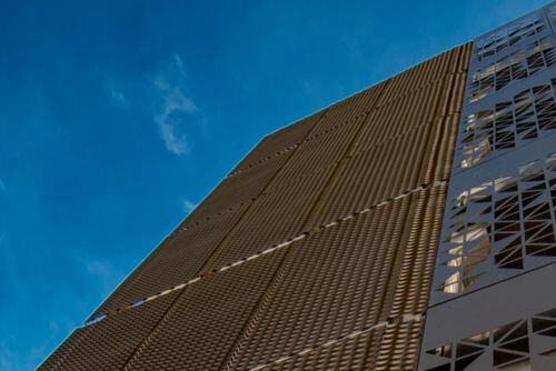 Architectural mesh Nebula Panel façade system - Maple Façades